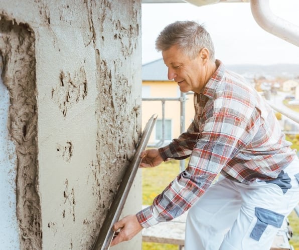 What is the difference between Plastering and Rendering?